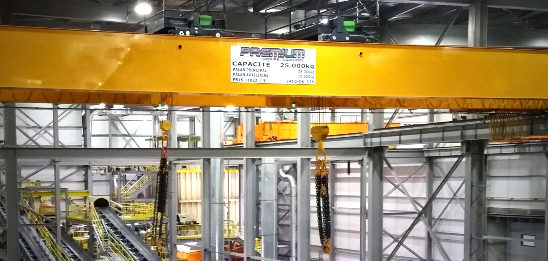 Can I add a hoist to my overhead crane to speed up production?